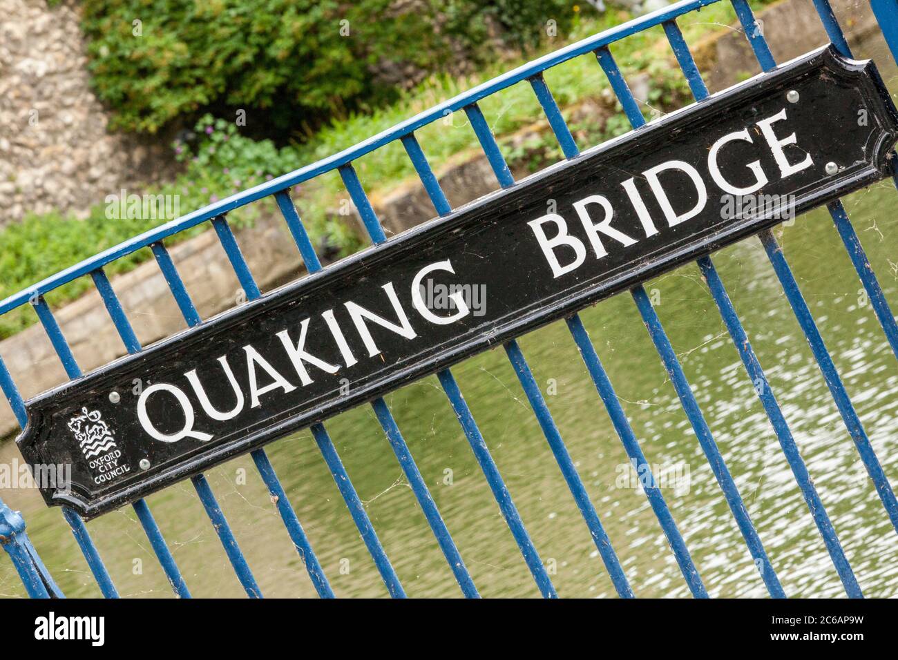 Sign for the Quaking Bridge, which runs over Castle Mill Stream, in ...