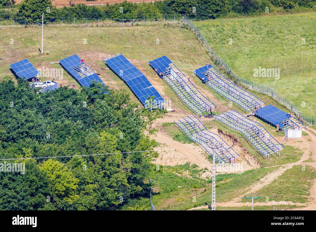 Solar park construction area on a hill Stock Photo - Alamy