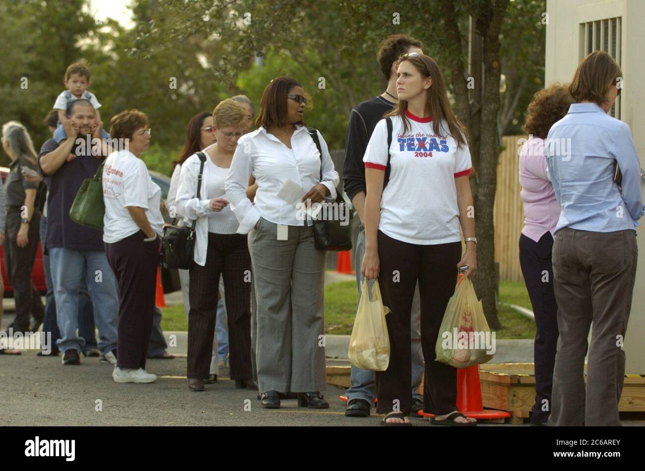 Austin, Texas USA, October 26, 2004: Early voters line up at a ...