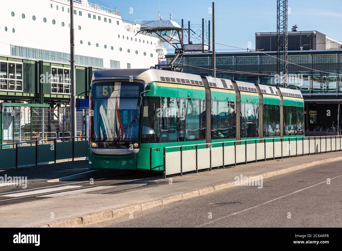Public transport, modern tram in Helsinki port in a beautiful summer ...