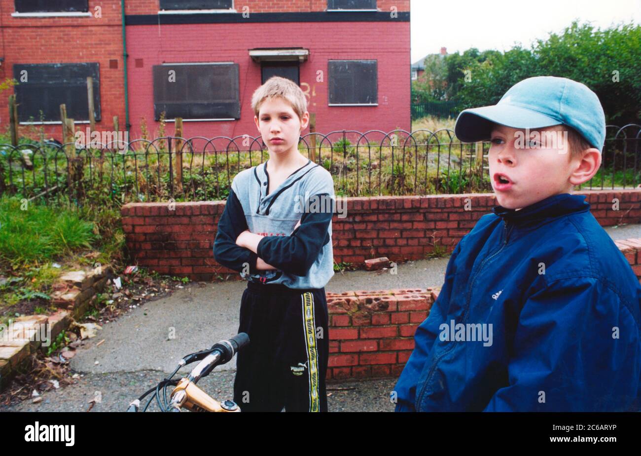 Two young boys on run down council estate; Leeds Stock Photo - Alamy