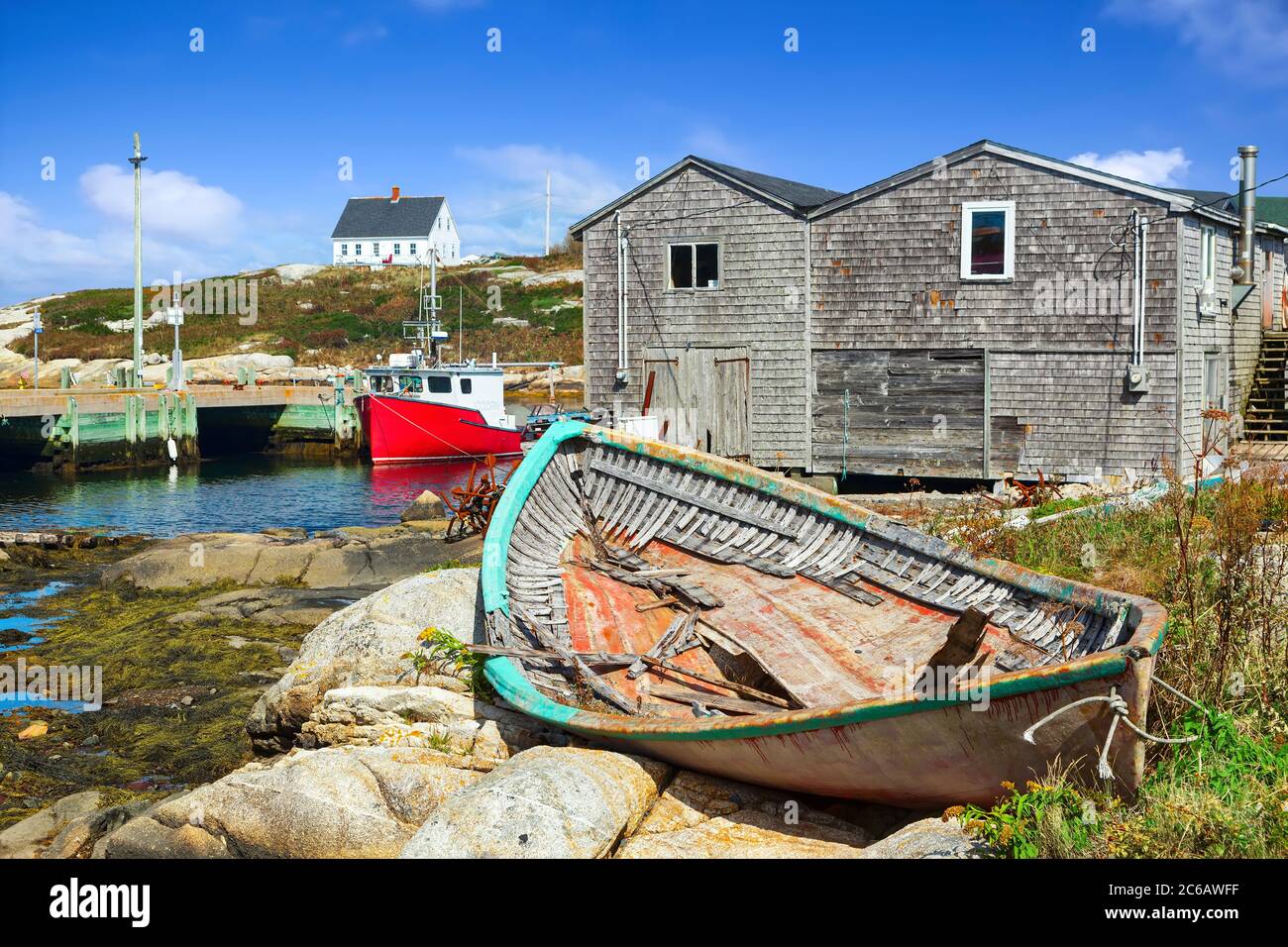 Old boat in small fishing village in Eastern Canada Stock Photo - Alamy