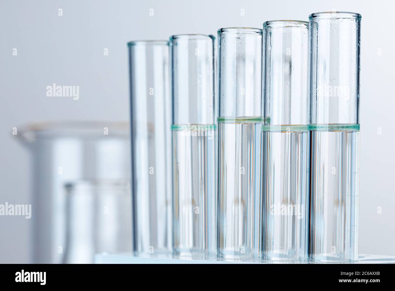 Laboratory glass test tubes with transparent liquid close up Stock ...