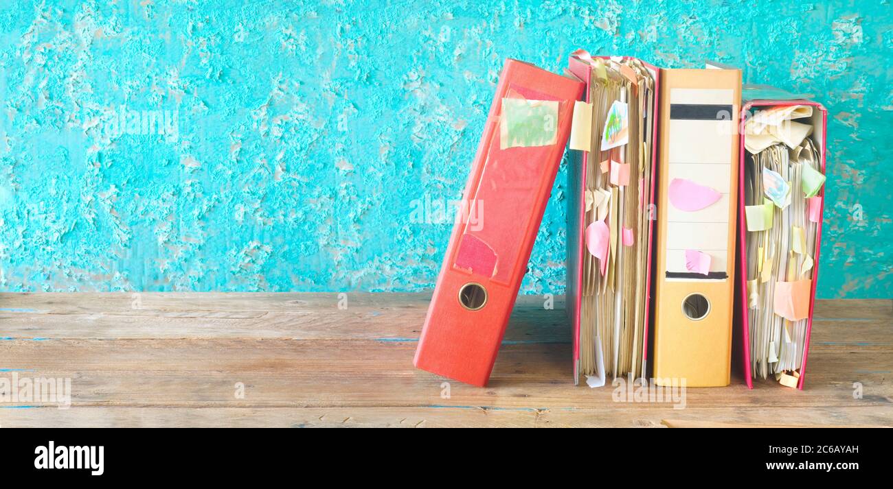 messy file folders and documents, bureaucracy and red tape concept ...