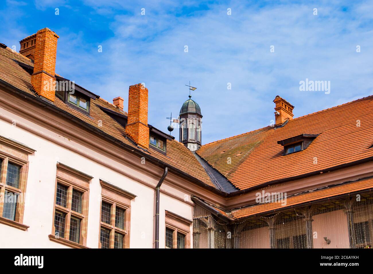 Old medieval building against the blue sky. Ancient architecture. House ...