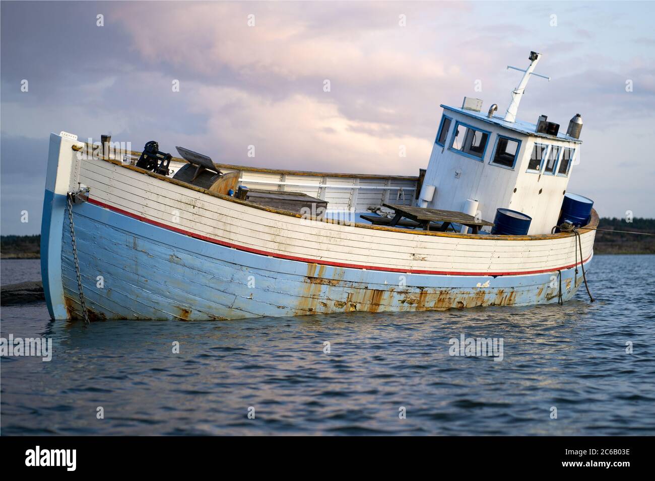 Aurora borealis over dark treetops Stock Photo - Alamy