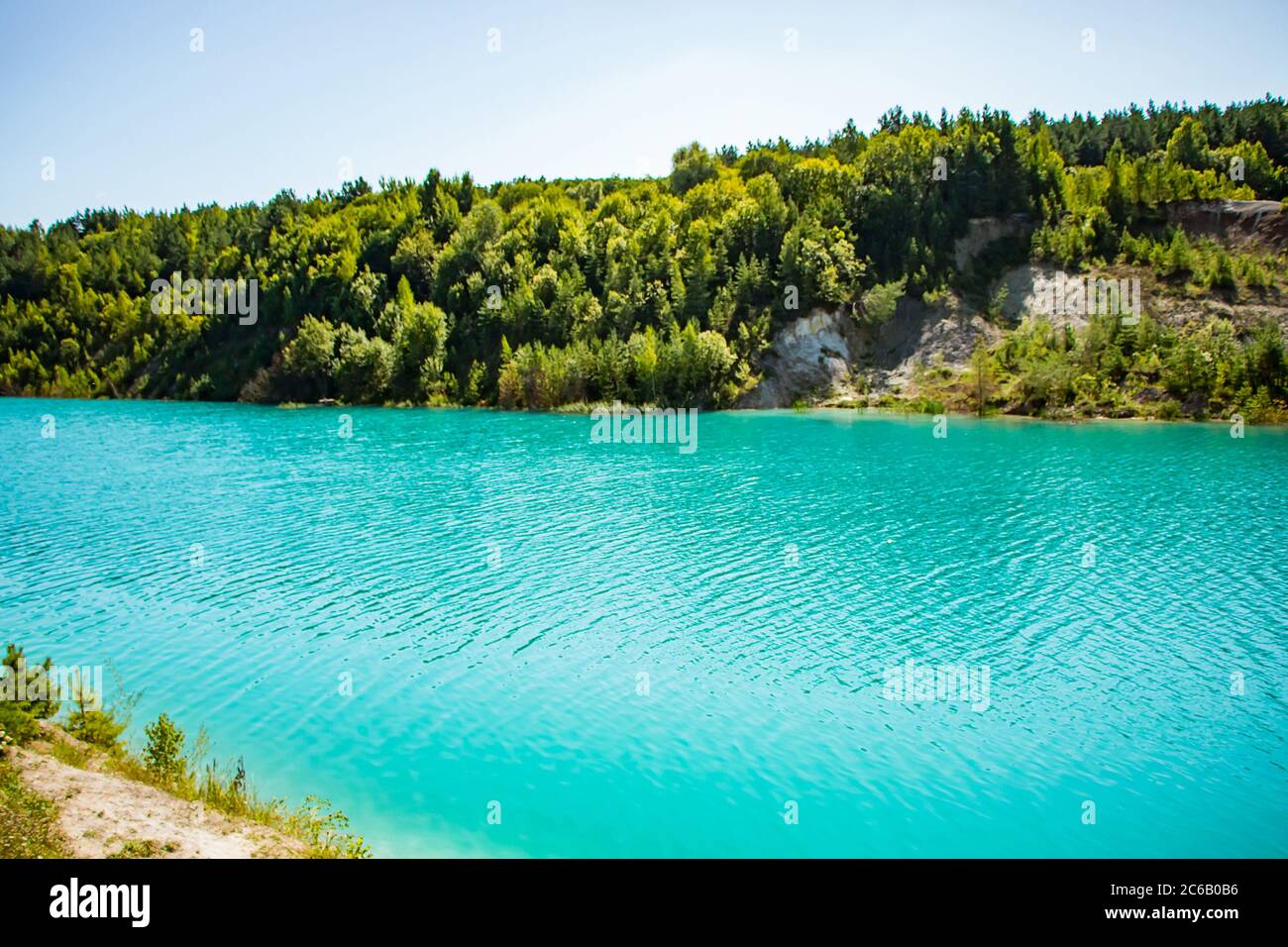 Beautiful mountain landscape - a lake with unusual turquoise water in ...