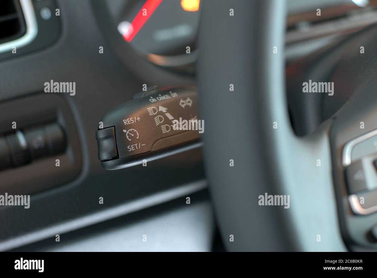 cruise control stick which is located behind the wheel Stock Photo - Alamy