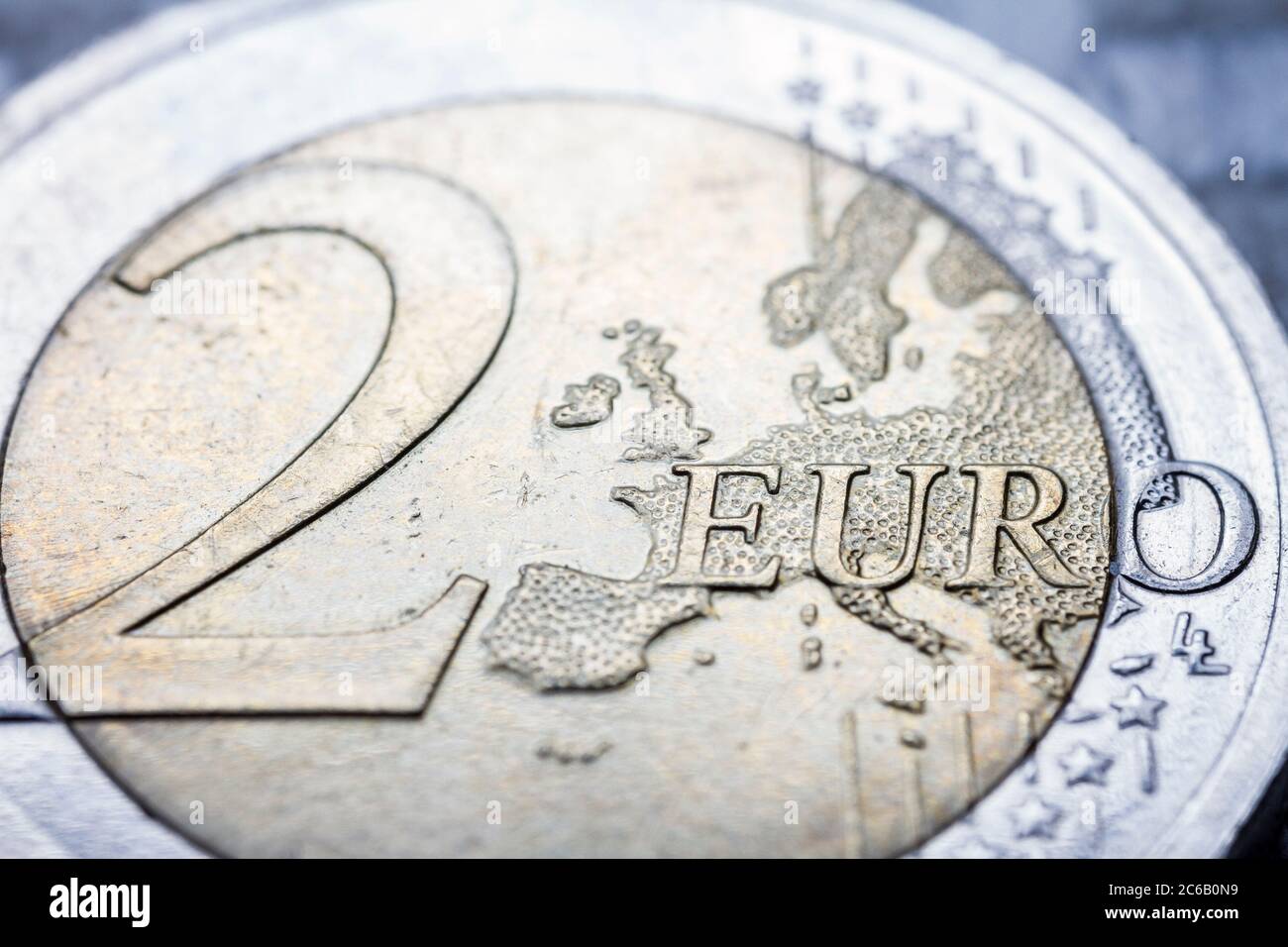 Two euro coin macro detail with euro word. 2 euro coin macro view ...
