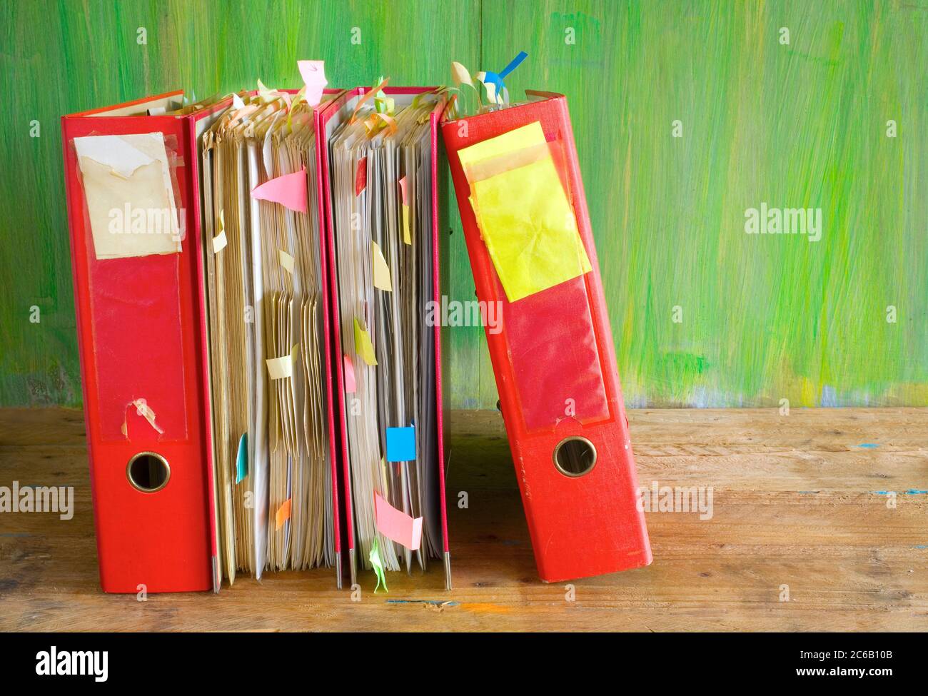 messy file folders and documents, bureaucracy and red tape concept ...