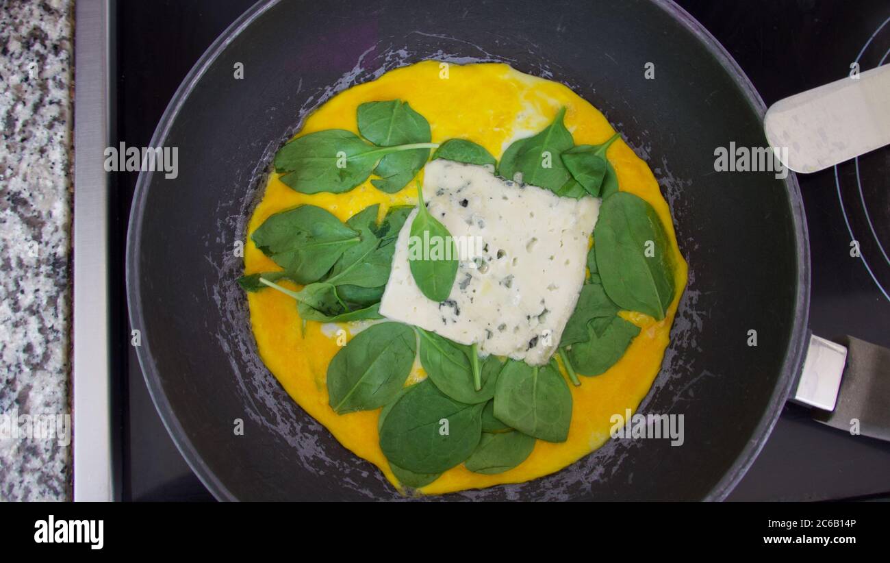 Omelette with spinach hi-res stock photography and images - Alamy