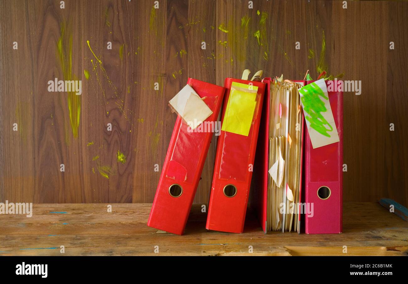 messy file folders and documents, bureaucracy and red tape concept ...