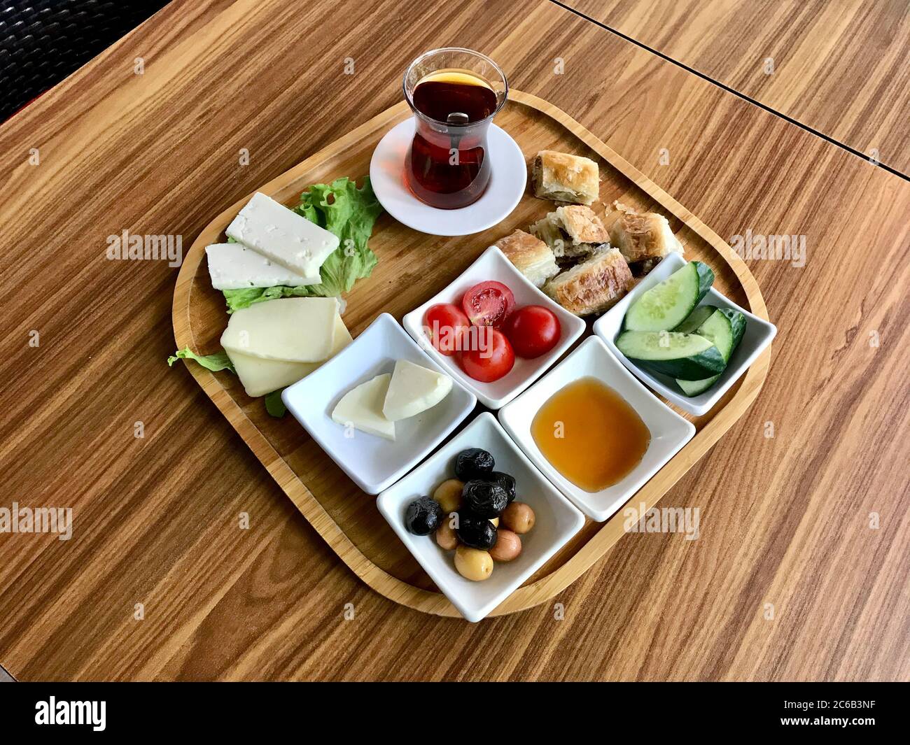Turkish Breakfast with Tea in Wooden Tray served at Local Restaurant ...