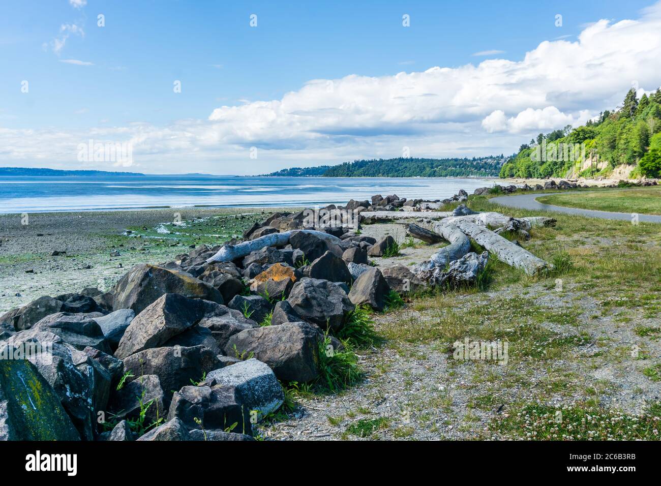 Rock line the at Saltwater State Park in Des Moines, Washington Stock ...