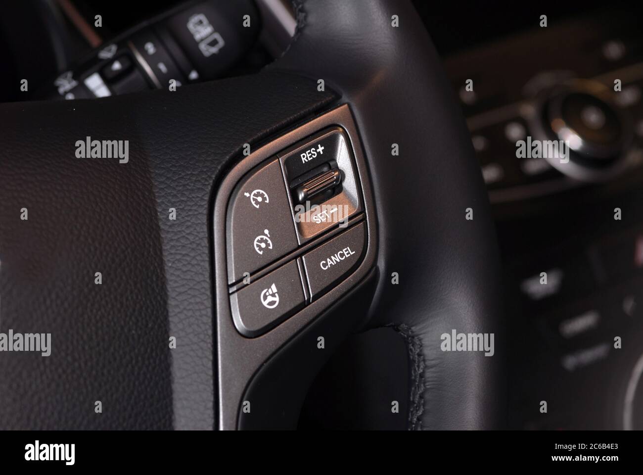 Cruise control button on the wheel Stock Photo - Alamy