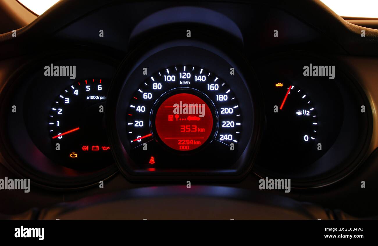 illuminated instrument panel with the passenger car Stock Photo - Alamy