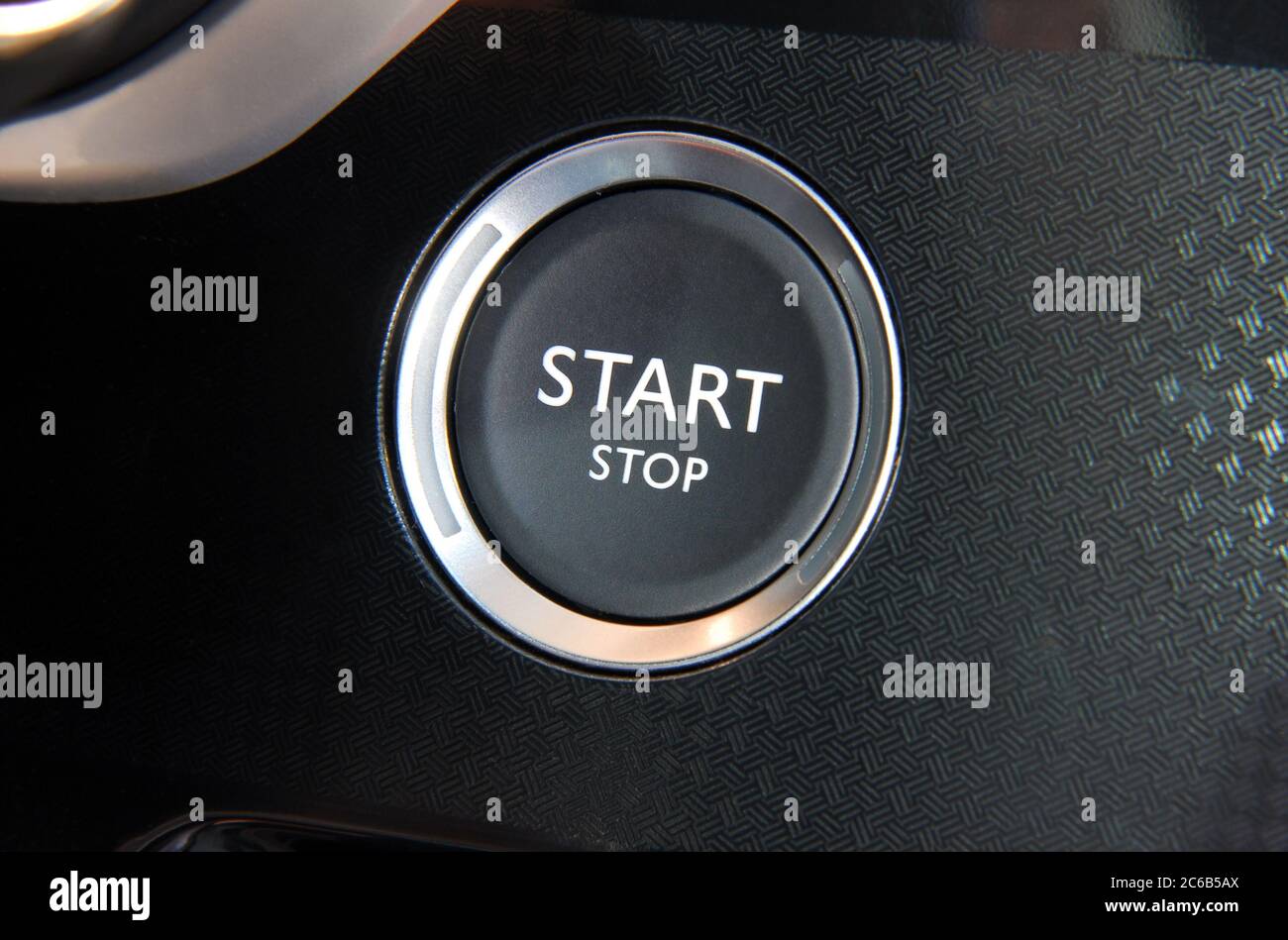 Start stop engine button on a modern car dashboard Stock Photo - Alamy