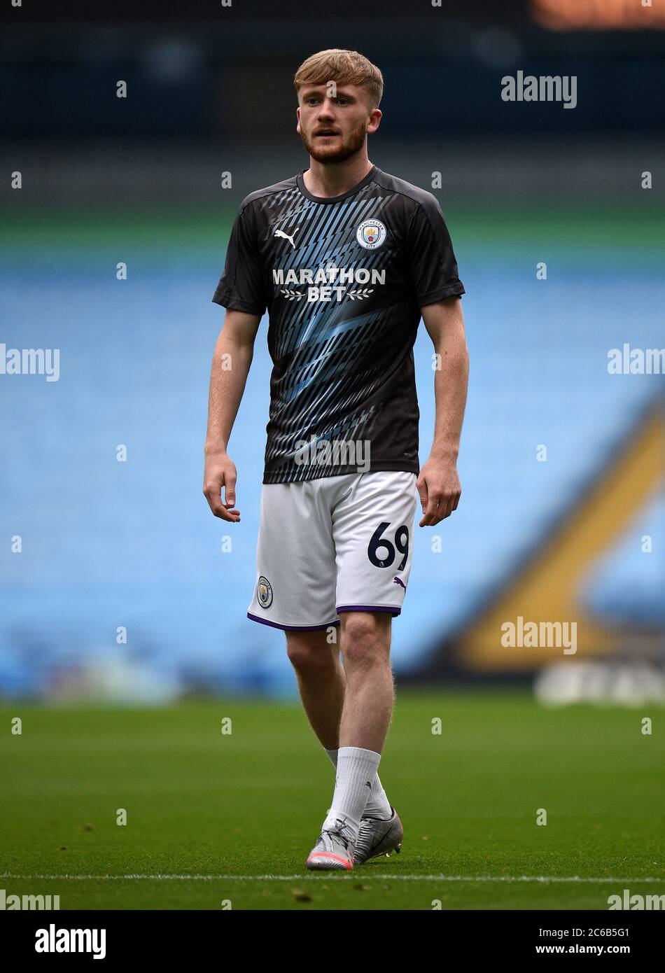 Manchester citys tommy doyle warms up hi-res stock photography and ...