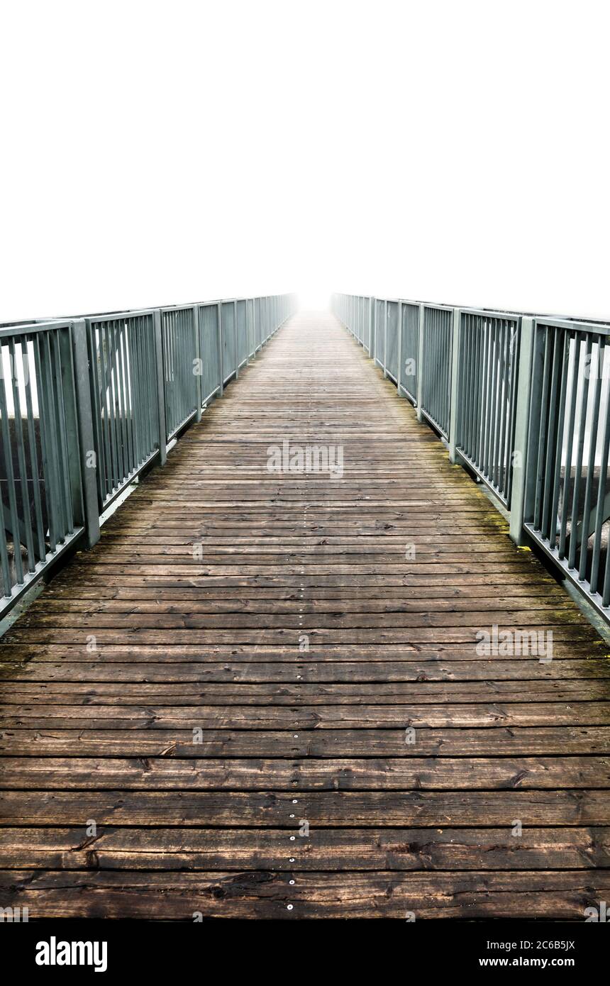 Bridge into the mist Stock Photo - Alamy