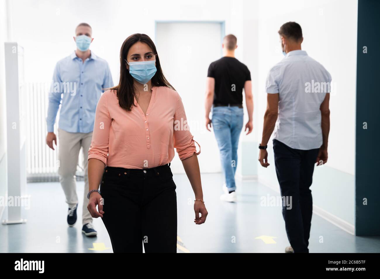 People In Office Following Social Distancing Protocols Wearing Face ...