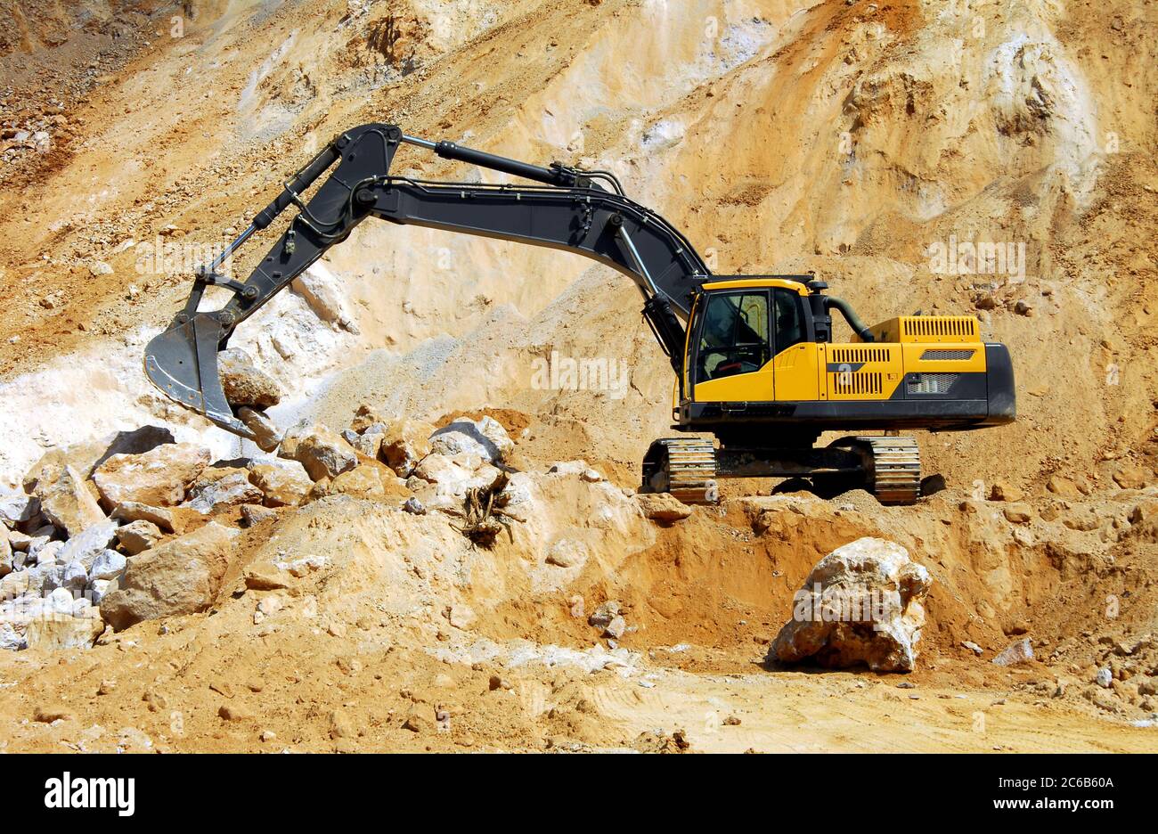 big yellow loader stands in the quarry Stock Photo - Alamy