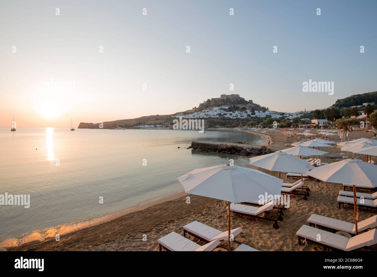 View over Lindos beach at sunrise, Lindos, Rhodes, Dodecanese, Greek ...
