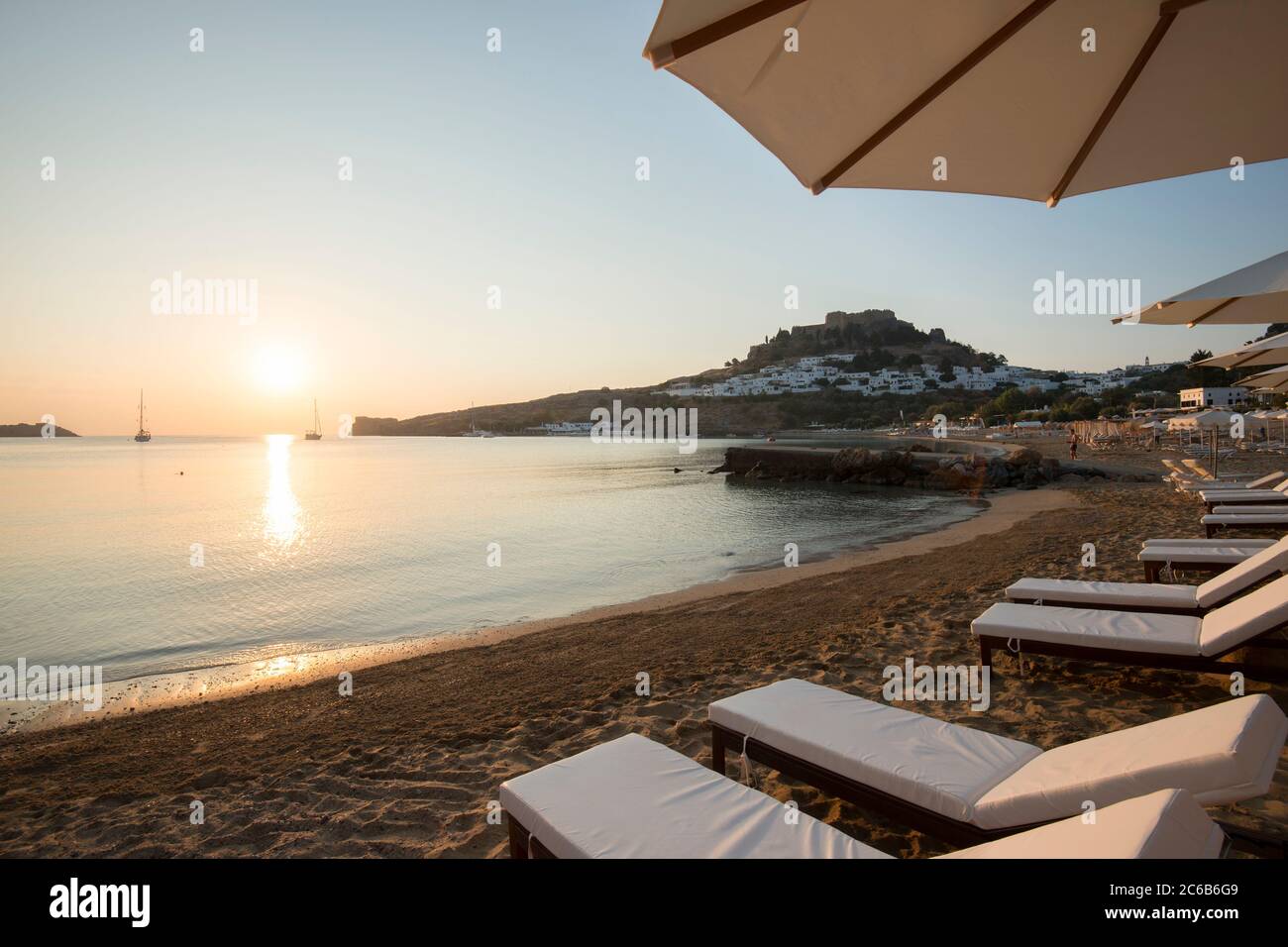 View over Lindos beach at sunrise, Lindos, Rhodes, Dodecanese, Greek ...