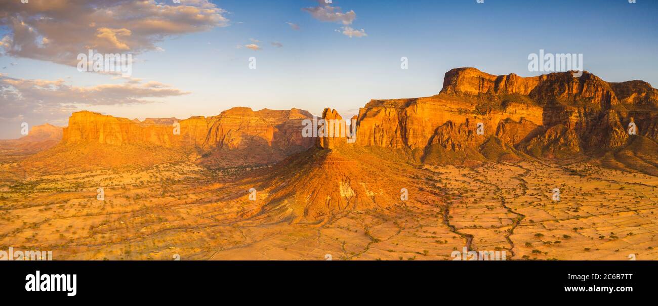 Aerial panoramic by drone of Gheralta Mountains lit by sunset, Hawzen ...