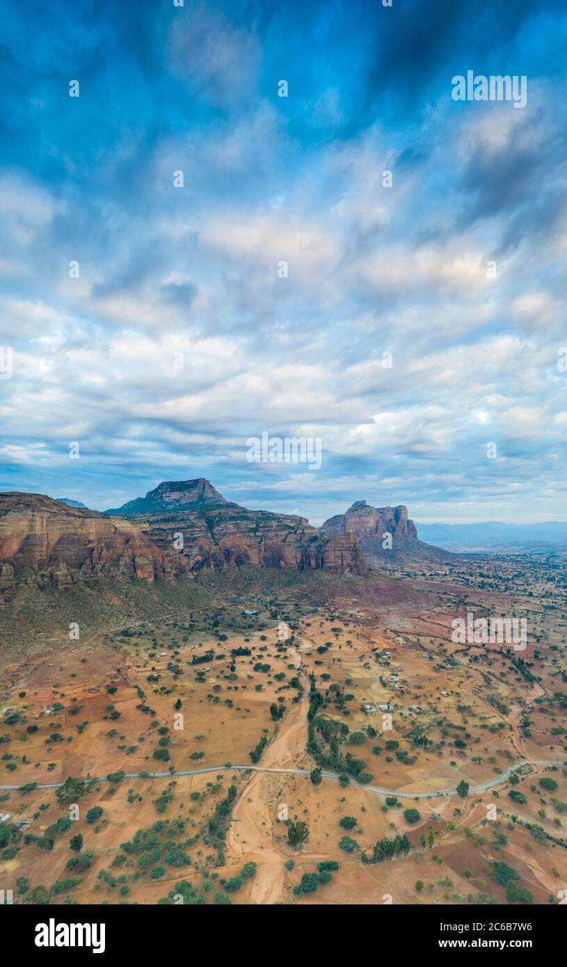Aerial panoramic by drone of clouds at sunset over Gheralta Mountains ...