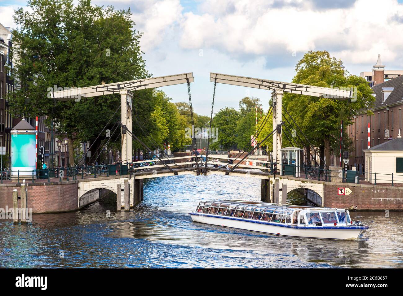 Canal and bridge in Amsterdam. Amsterdam is the capital and most populous city of the ...