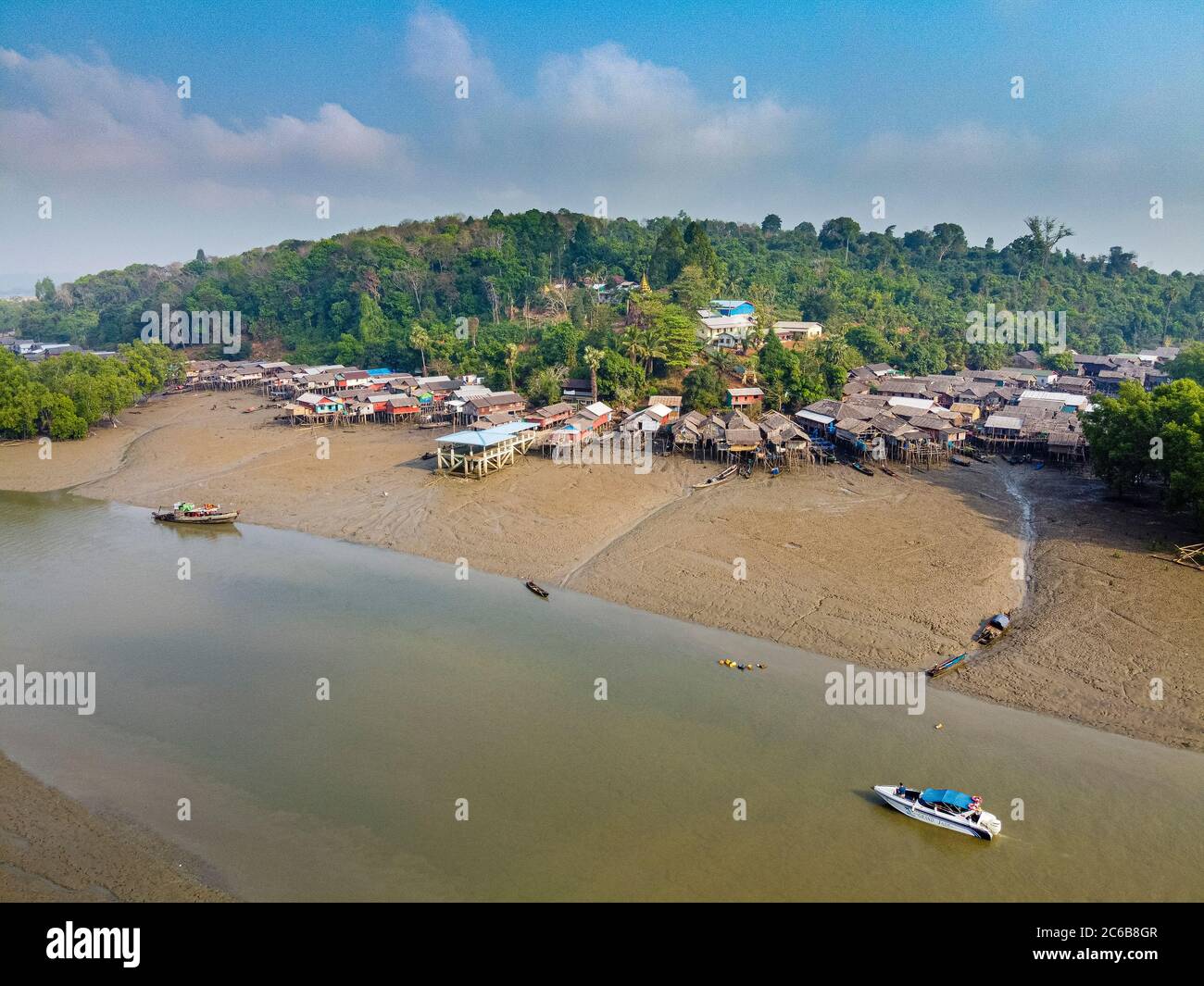 Aerial by drone of Fishing village on stilts in the mangroves of the ...