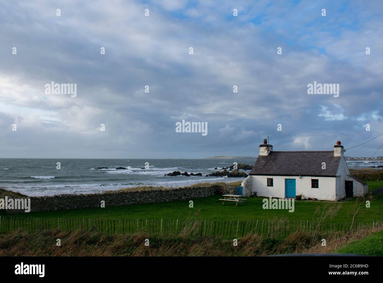 A remote isolated, traditional, country cottage by a windswept beach on ...