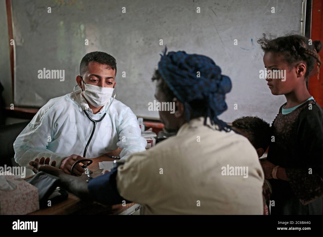 Sanaa, Yemen. 08th July, 2020. A volunteer doctor measures the blood ...