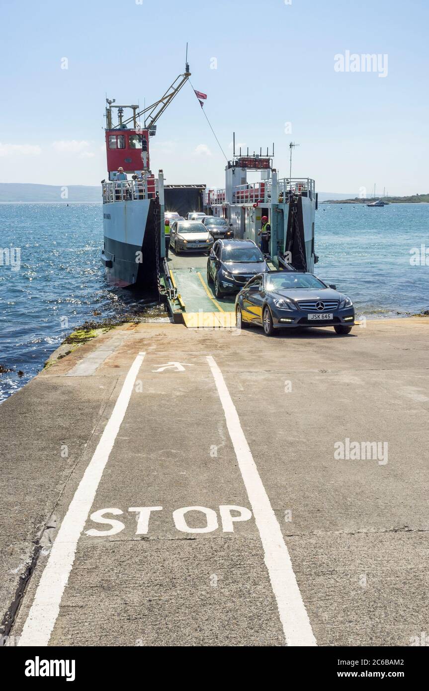 Cars arriving on The MV Loch Ranza Ferry at the Island of Gigha from ...