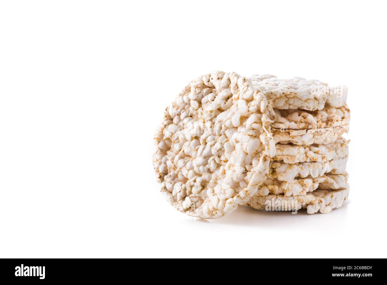 Pile of puffed rice cakes isolated on white background Stock Photo - Alamy
