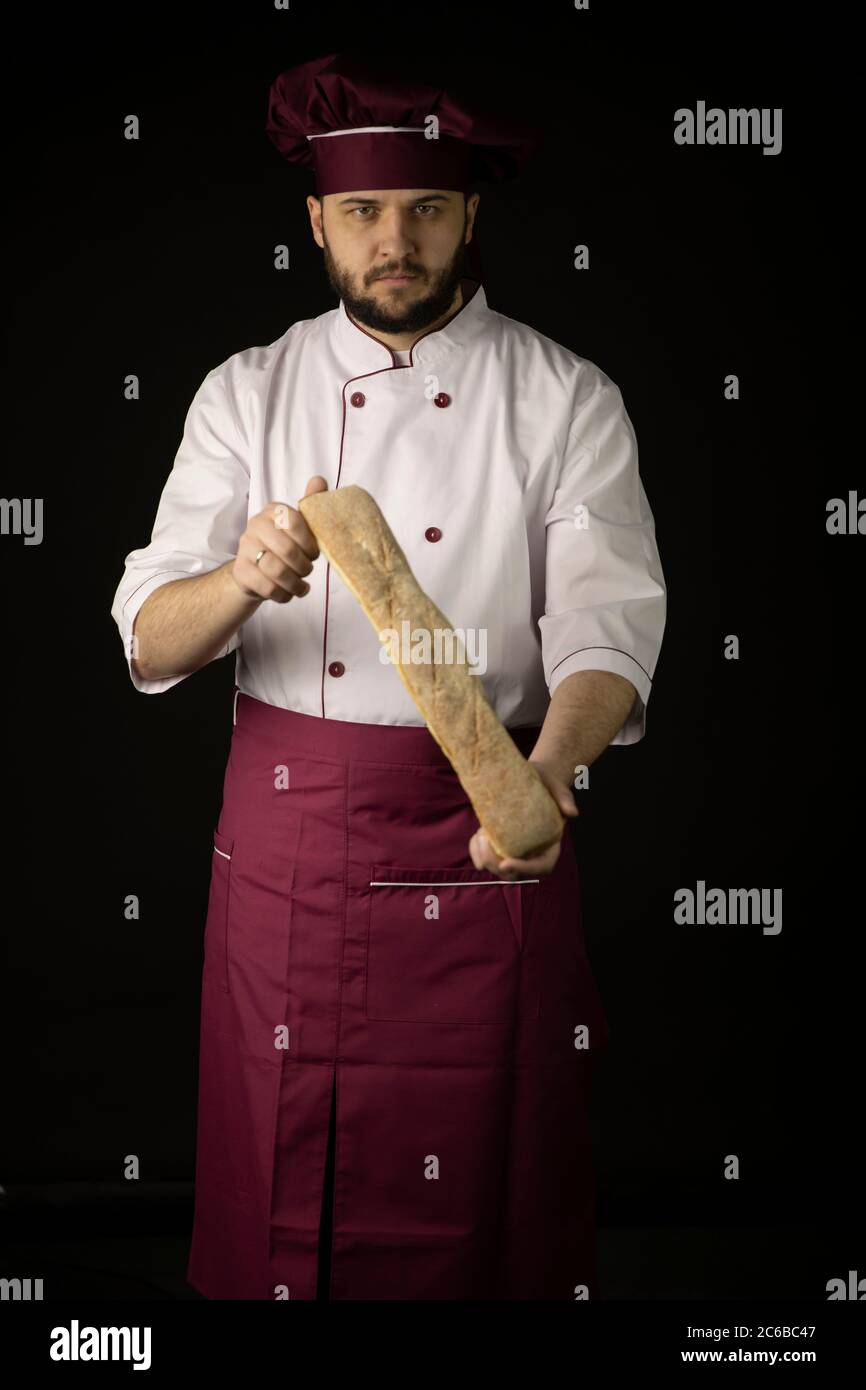 Professional baker wearing black hi-res stock photography and images ...