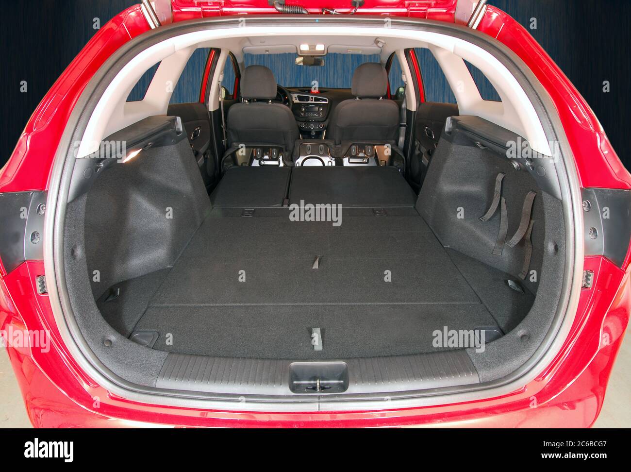 car trunk with rear seats folded Stock Photo - Alamy