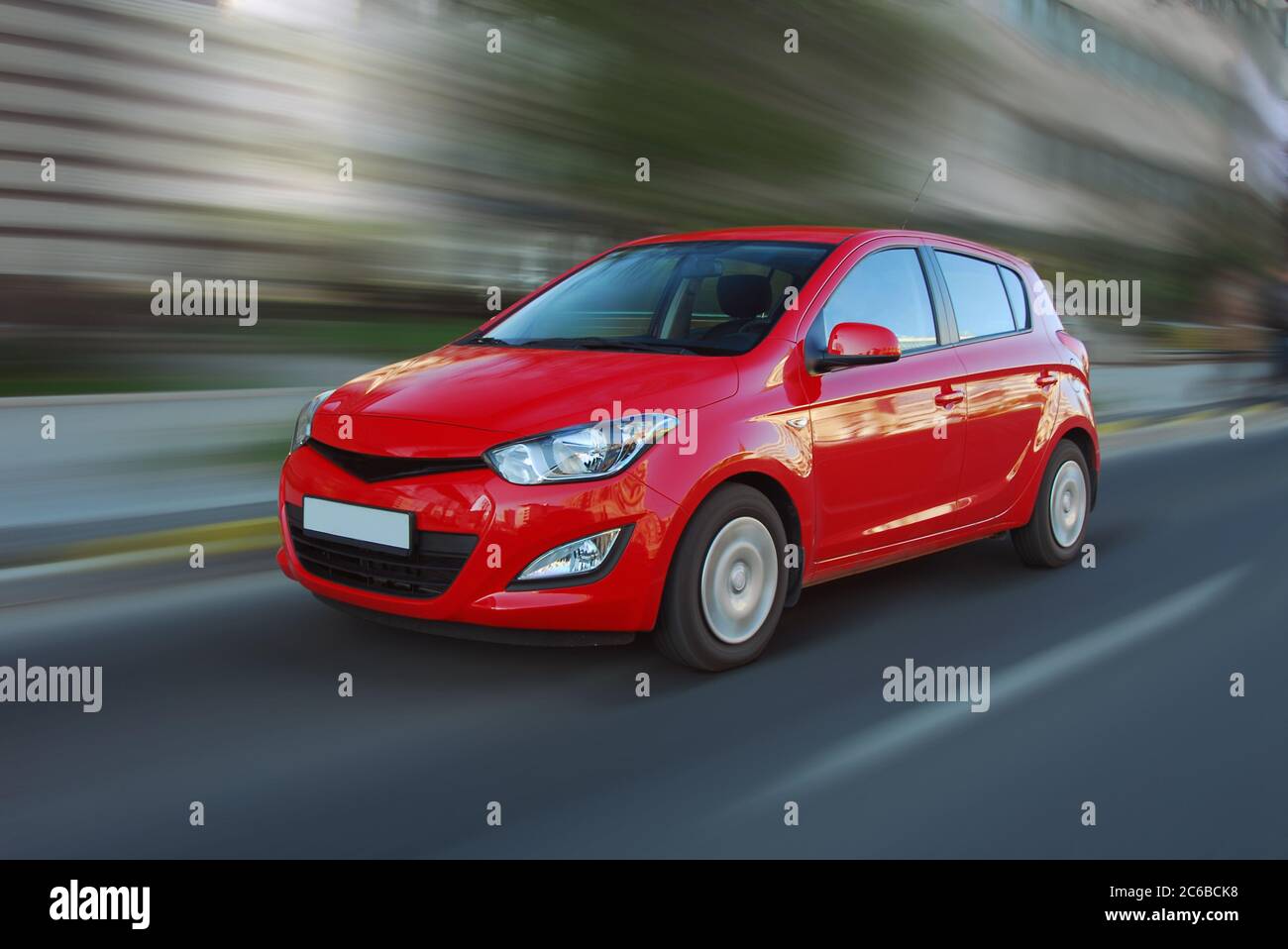 moving red car Stock Photo - Alamy