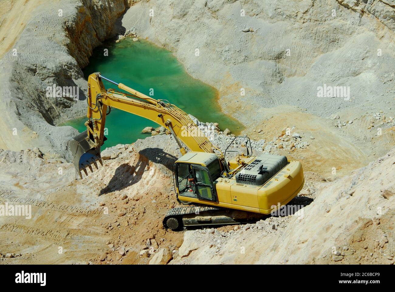 big yellow loader stands in the quarry Stock Photo - Alamy