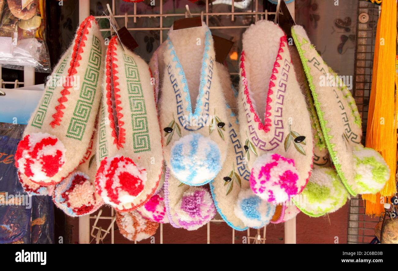 Traditional greek handmade woollen slipper Tsarouchi. Crete, Greece ...