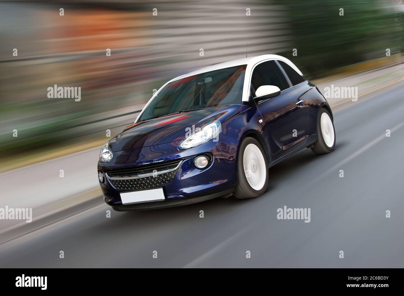 Speeding blue car hi-res stock photography and images - Alamy