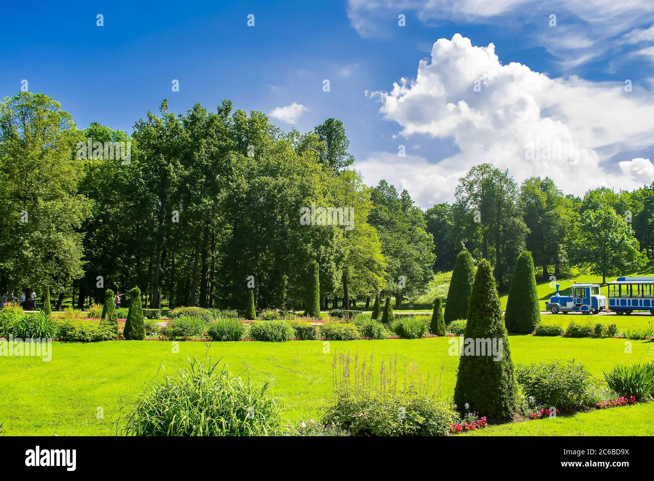 Green park with paths, trees and fountains Stock Photo - Alamy