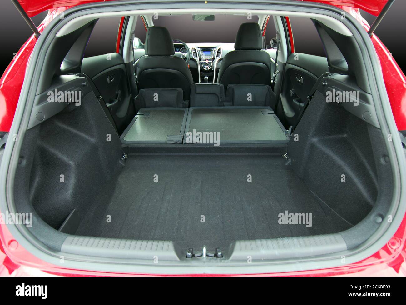 car trunk with rear seats folded Stock Photo - Alamy