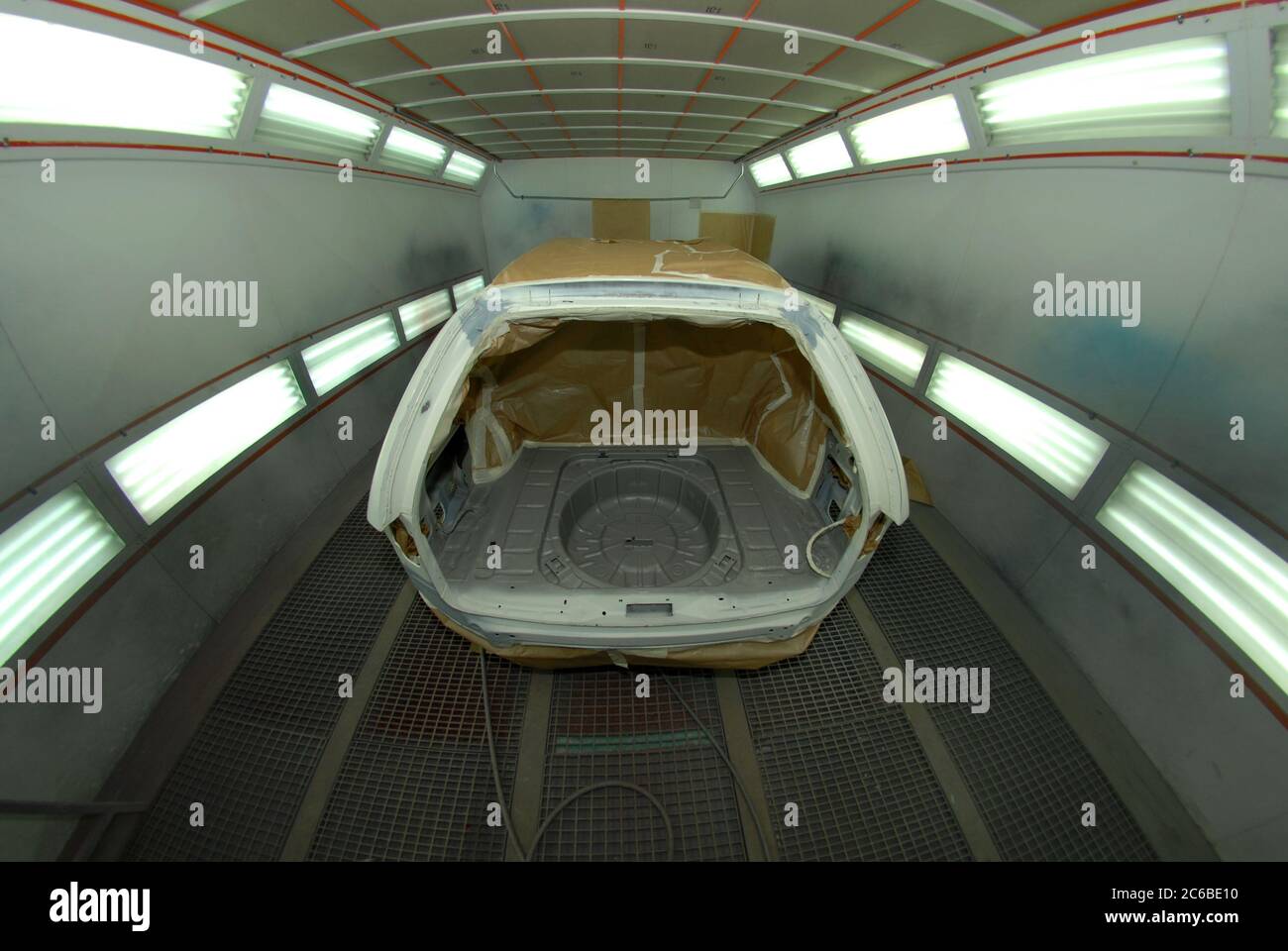 chamber for painting cars, car in a paint chamber, The car is prepared ...