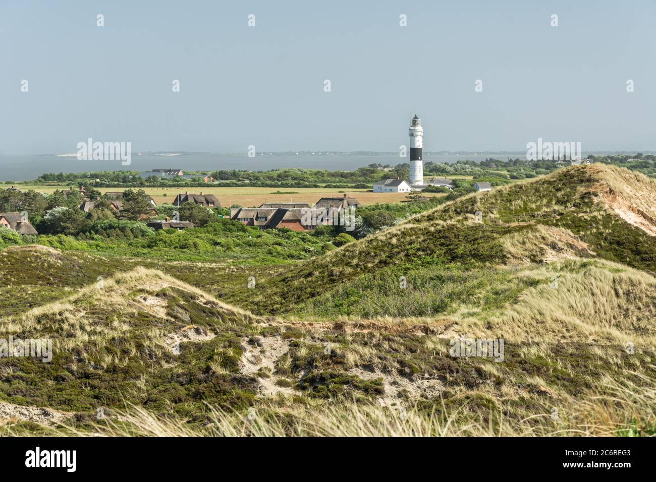 Lighthouse in dune landscape on the island of Sylt, Germany Stock Photo ...