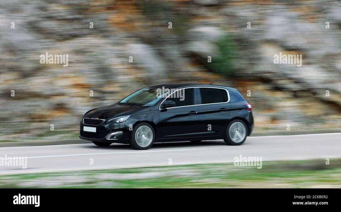 moving car, car photographed at high speeds, passenger car at high ...