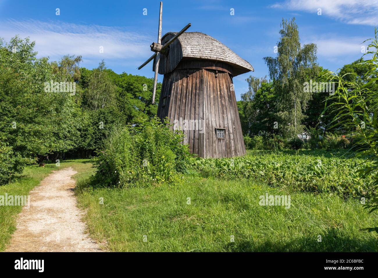 Wooden mill in the countryside. Traditional village in Poland. Open Air ...