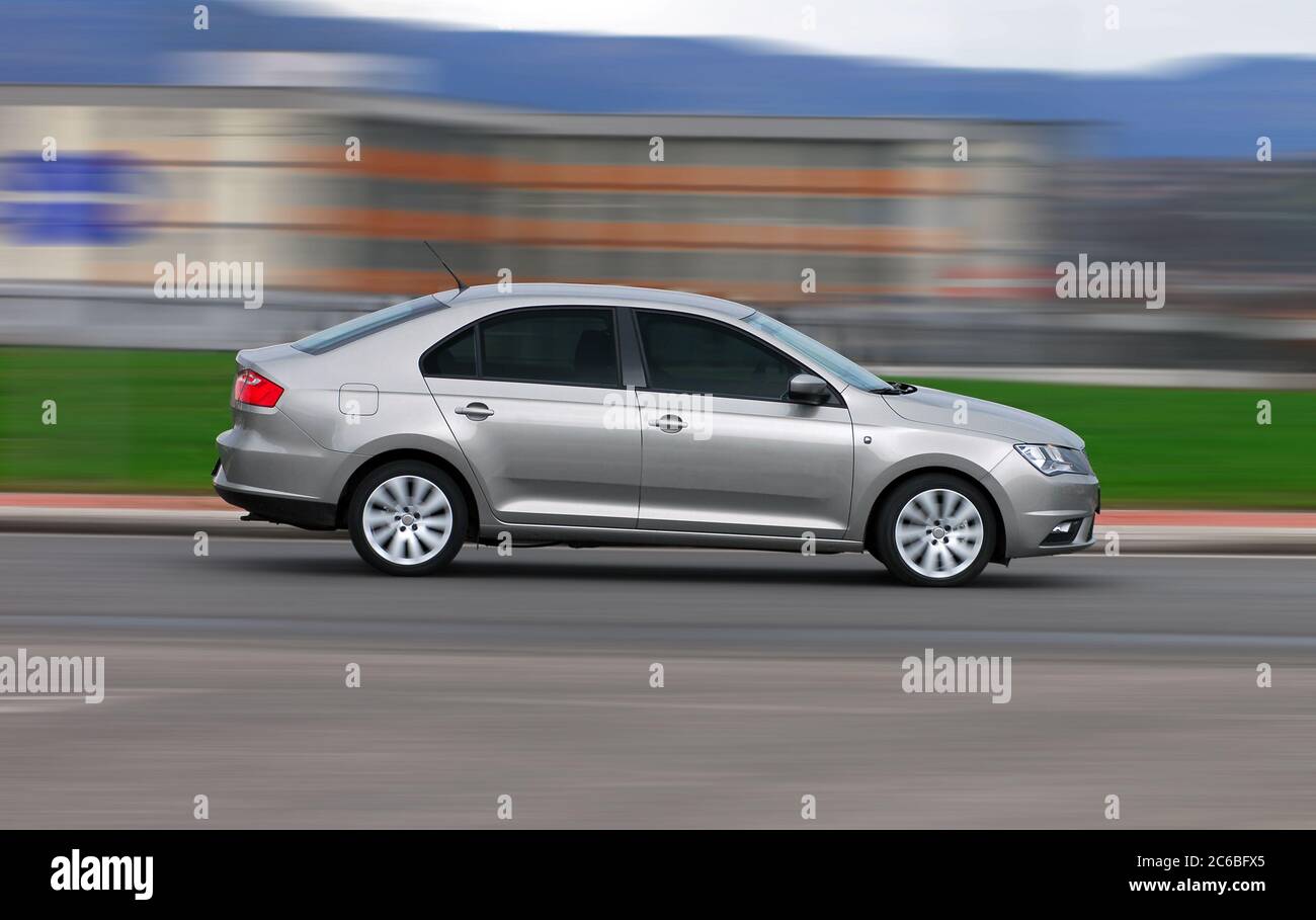 moving car, A panning shot of a speeding passenger car Stock Photo - Alamy