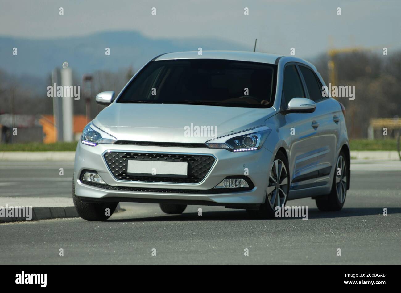 driving too fast, car going at high speed cornering Stock Photo - Alamy