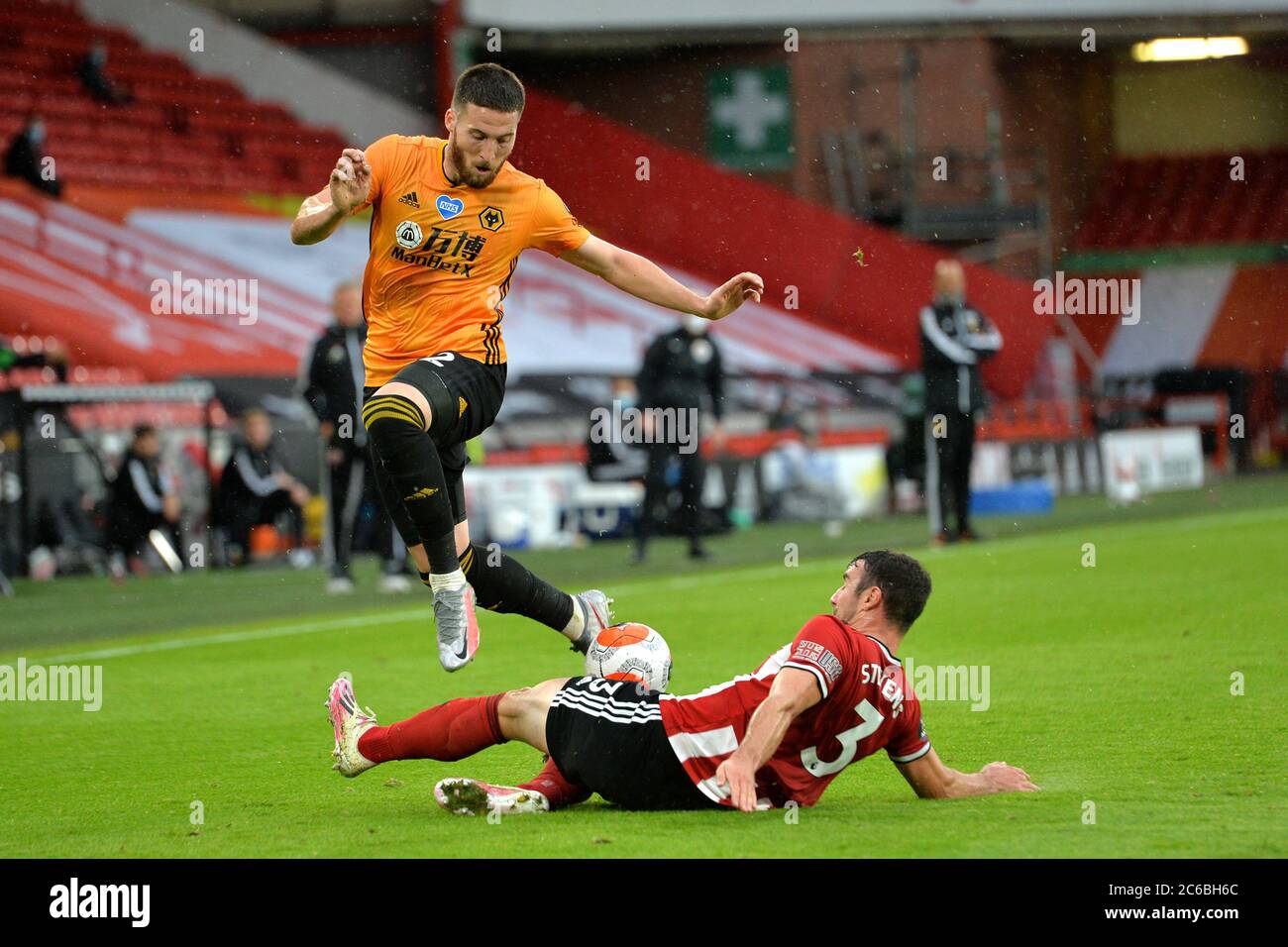 Wolverhampton Wanderers' Matt Doherty (left) jumps a challenge from ...